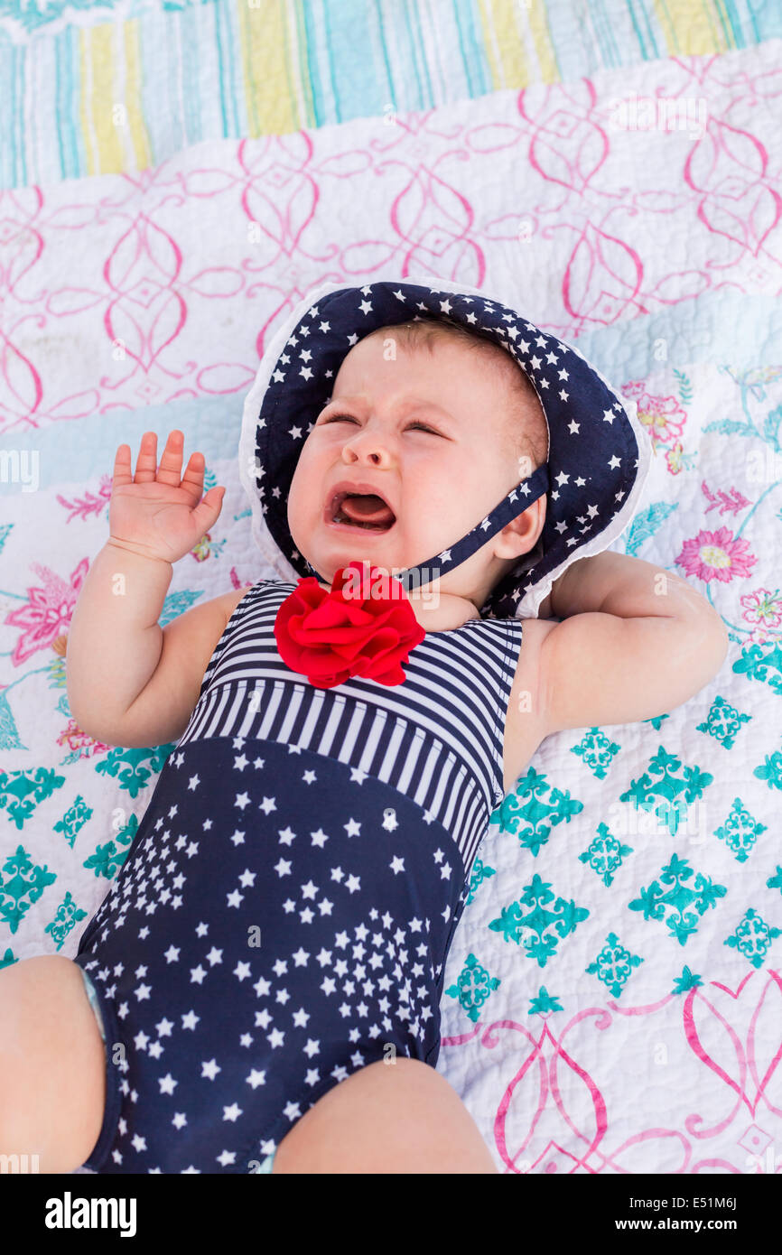 Infant crying beach hi-res stock photography and images - Alamy