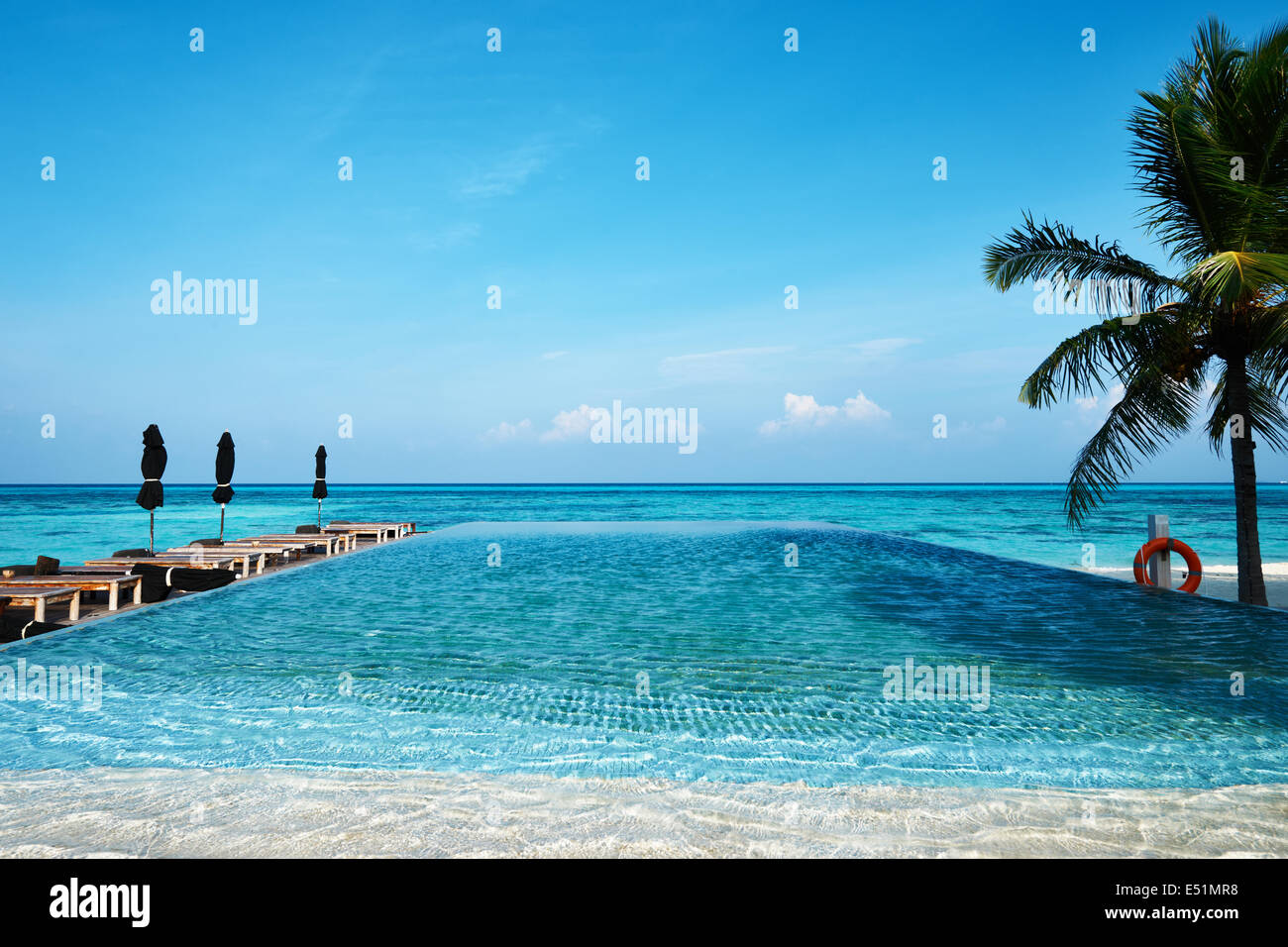 Luxury tropical swimming pool Stock Photo - Alamy