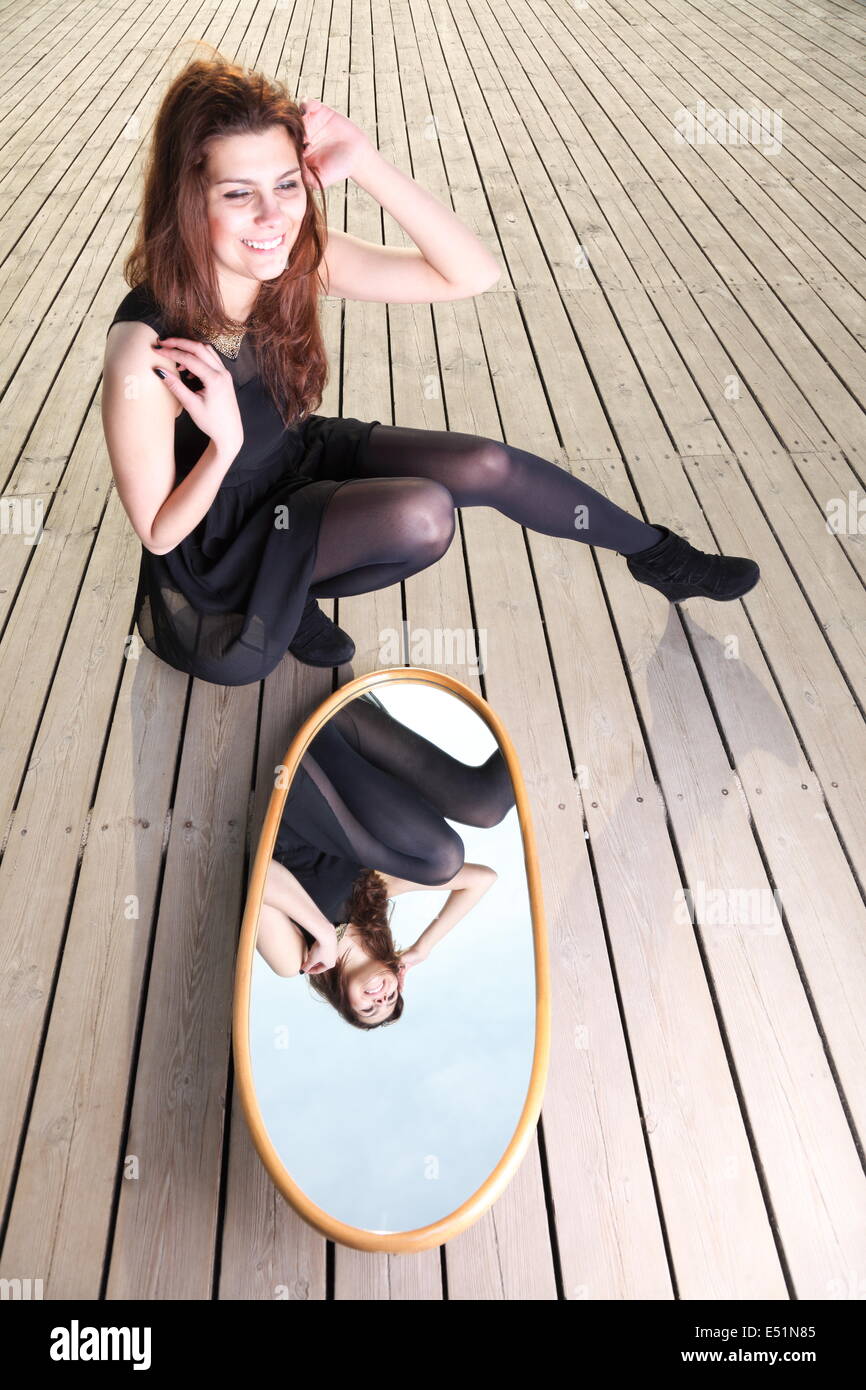 Mirror reflection smiling hi-res stock photography and images - Alamy