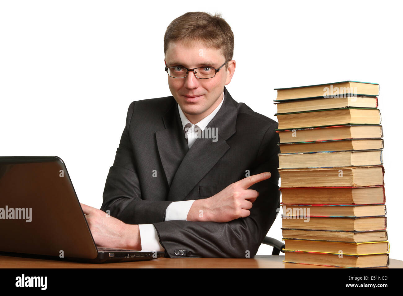 young guy working at a laptop Stock Photo - Alamy