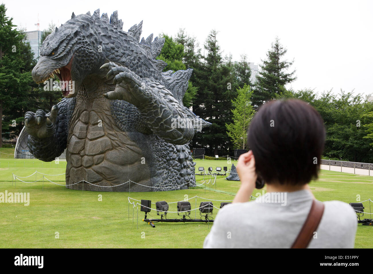 Tokyo, Japan. 18th July, 2014. A woman takes pictures of the 6.6 meter ...