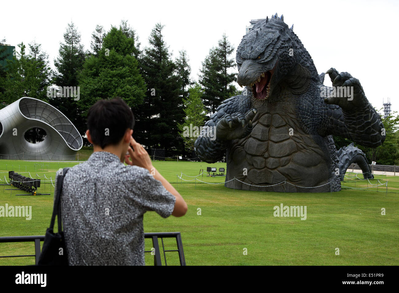 Tokyo, Japan. 18th July, 2014. A man takes pictures of the 6.6 meter ...