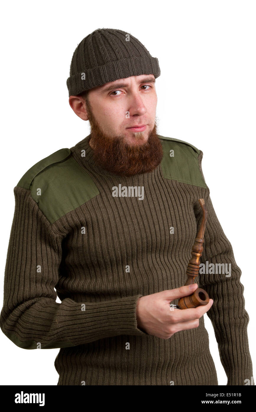 Young bearded guy smoking pipe hi-res stock photography and images - Alamy
