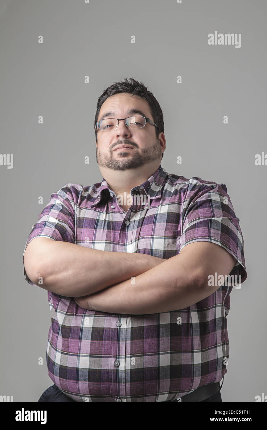 Big man with arm cross Stock Photo - Alamy