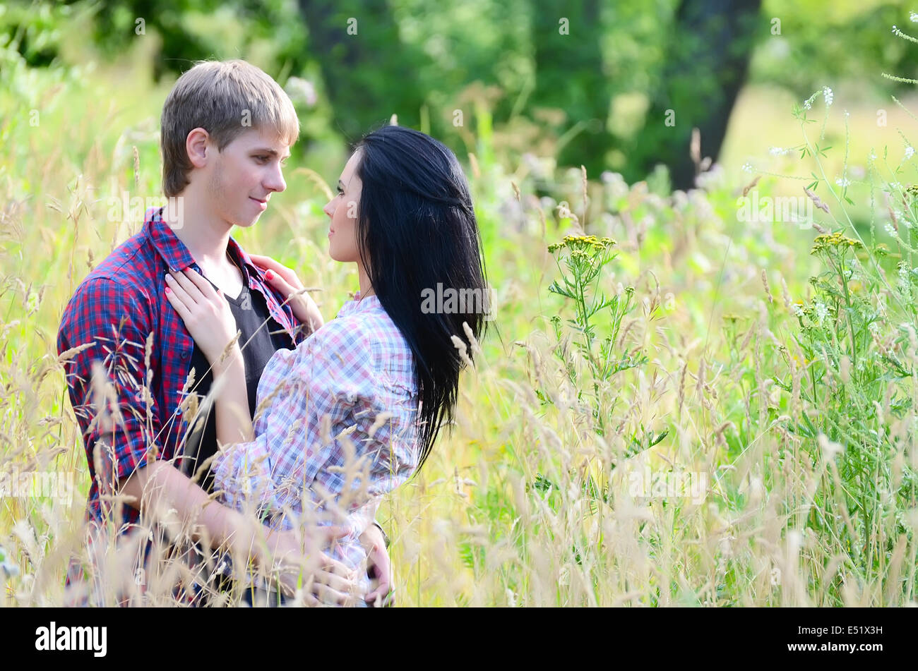 Enamoured young pair on the nature Stock Photo - Alamy