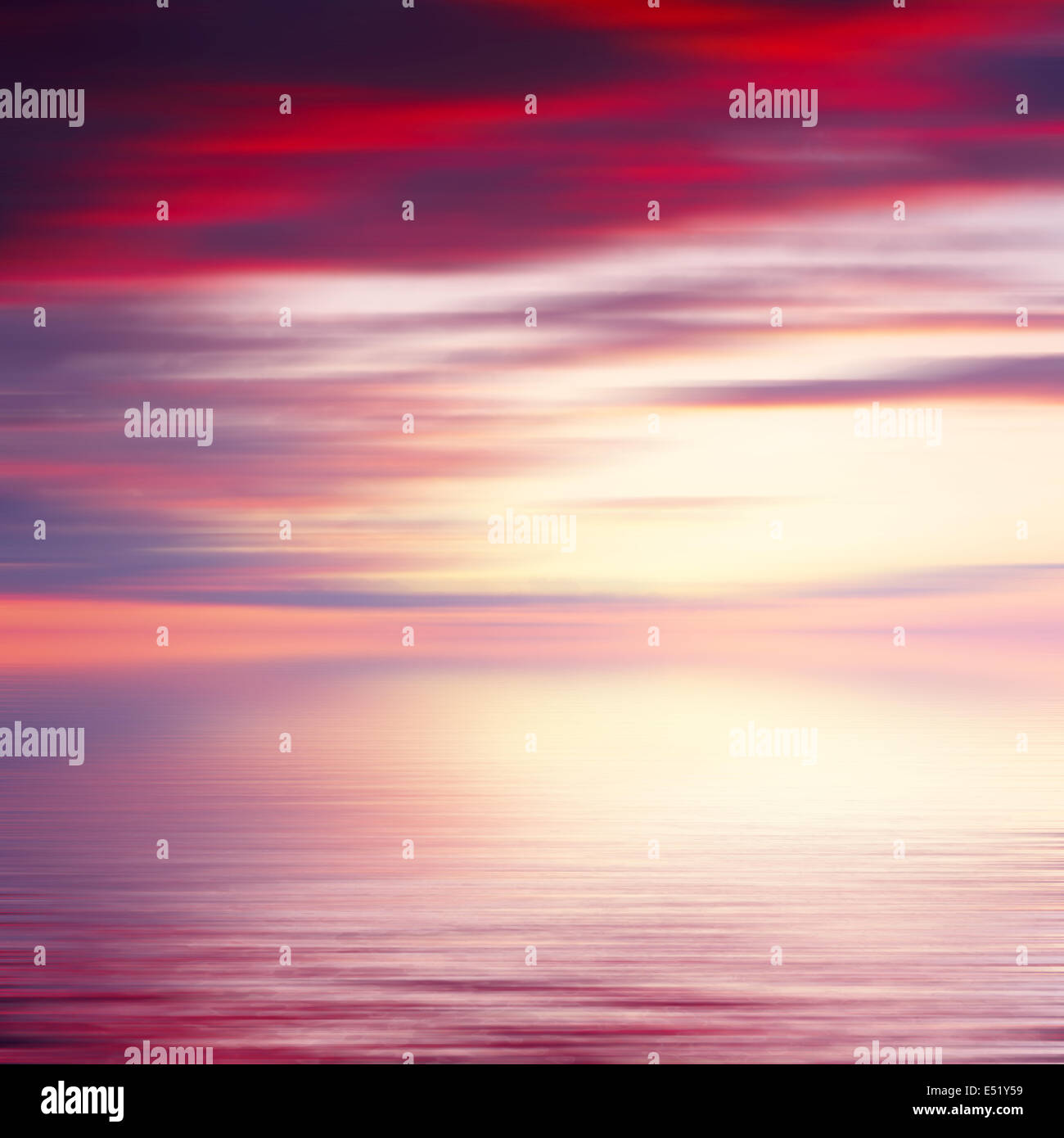 Abstract sunrise seascape background Stock Photo - Alamy