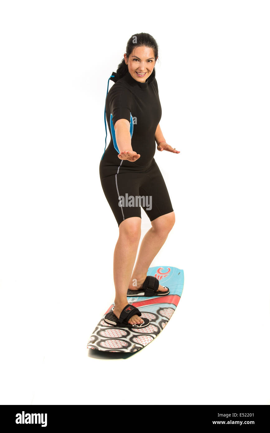 Surfer woman on surfboard being in action isolated on white background ...