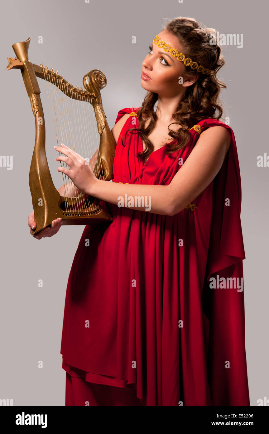 girl in a red tunic Stock Photo - Alamy
