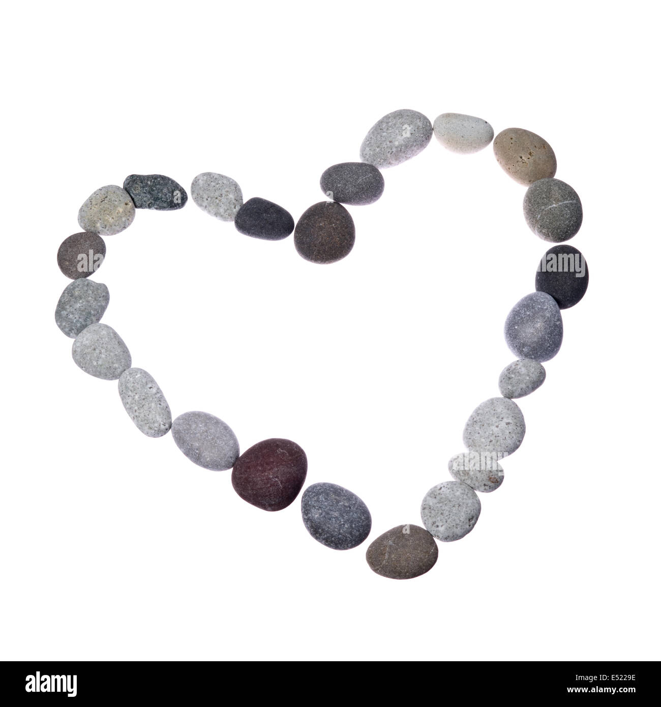 Heart form frame of colored sea stones Stock Photo - Alamy
