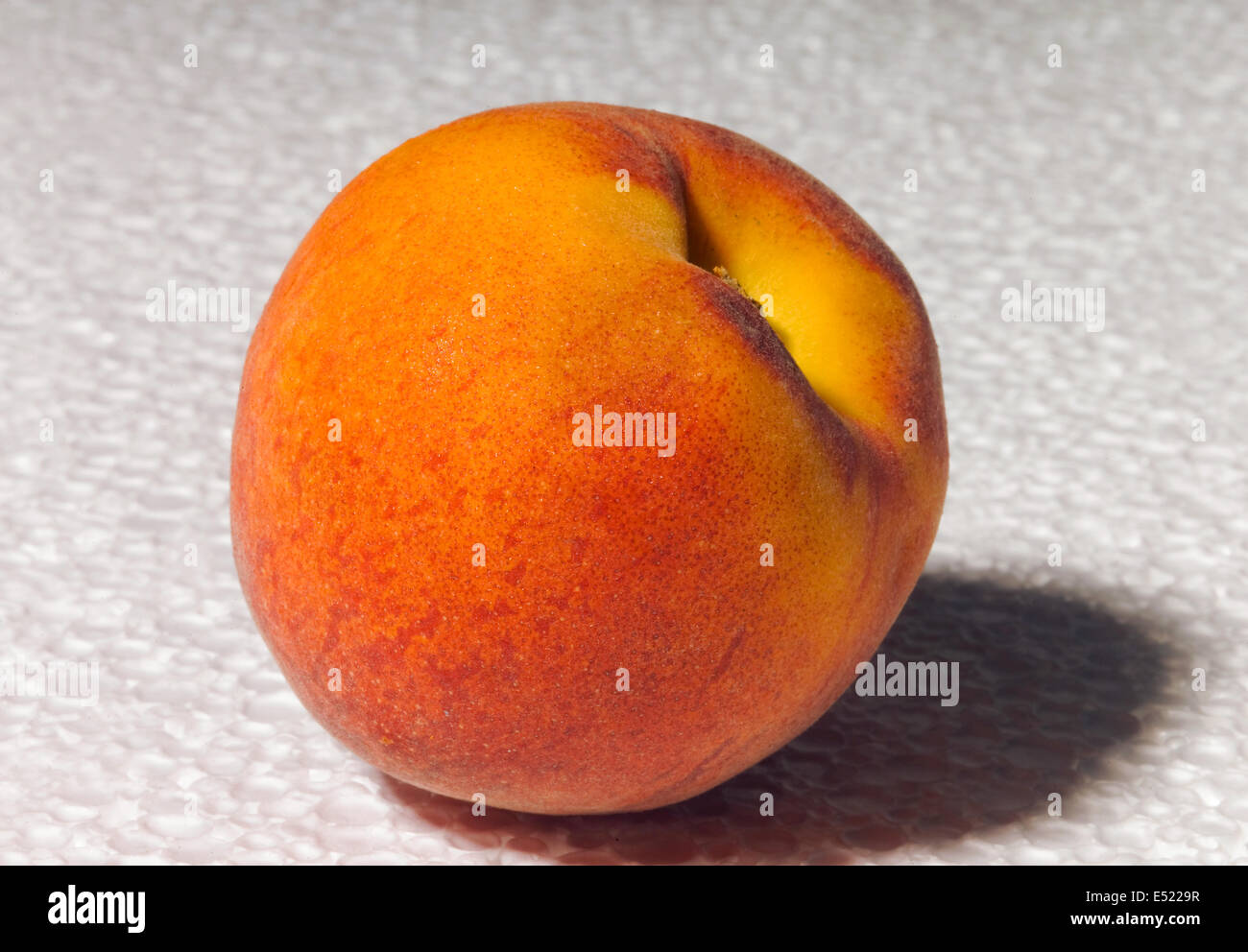 Juicy peach hi-res stock photography and images - Alamy