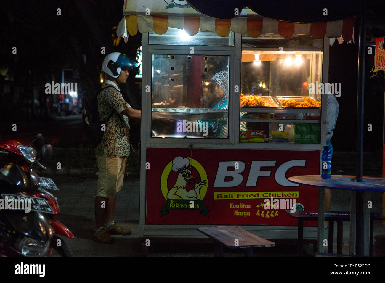 Jimbaran, Bali, Indonesia. Young Man at a Bali Fried Chicken Stand, at ...