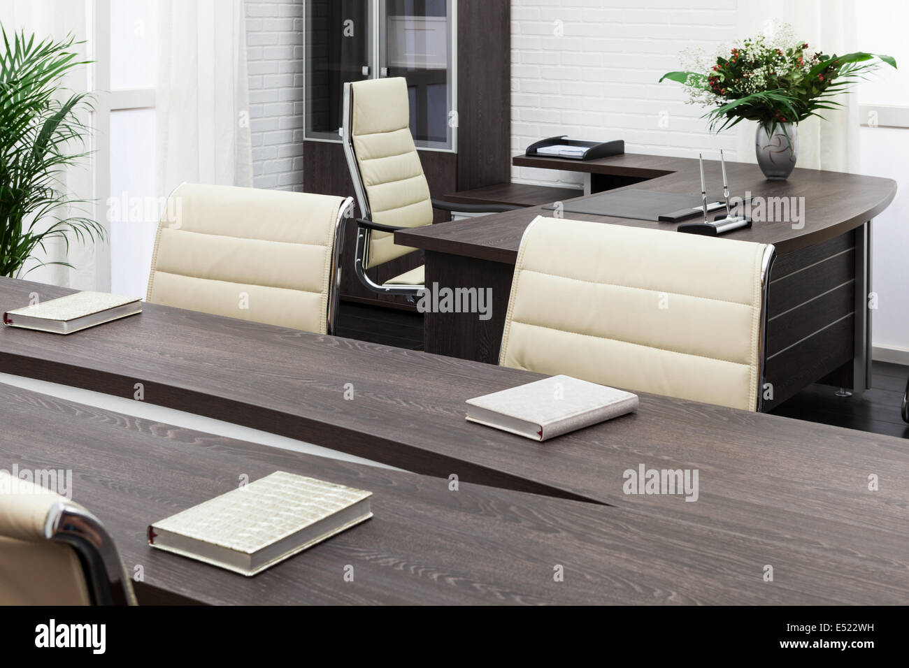 flowers on a desk Stock Photo - Alamy