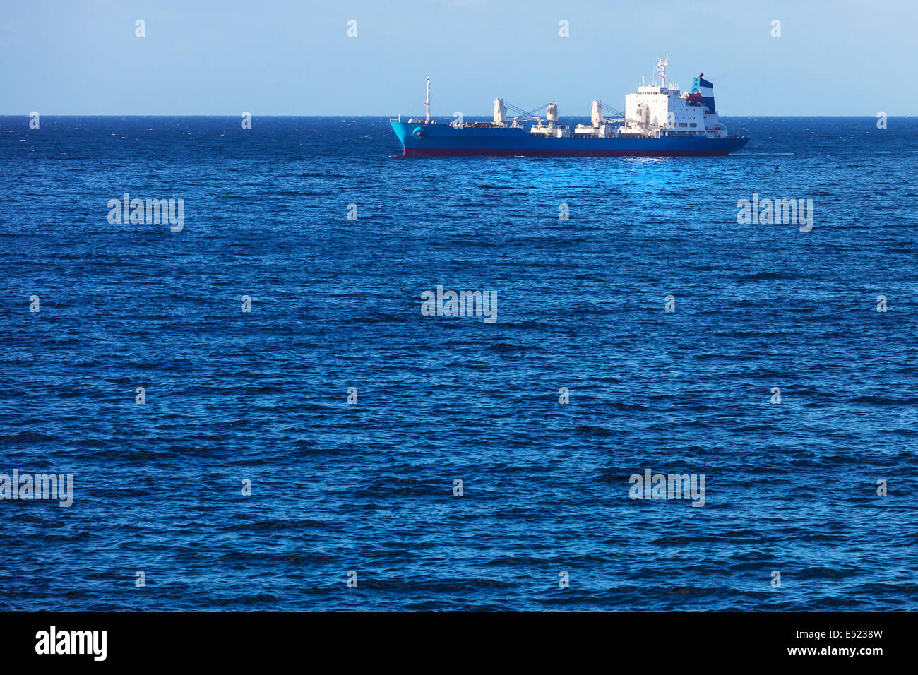 cargo ship in ocean Stock Photo - Alamy