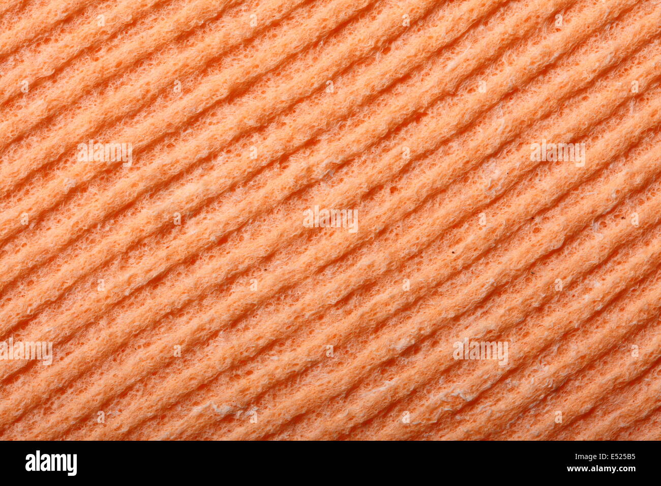 Orange sponge foam as background texture Stock Photo - Alamy