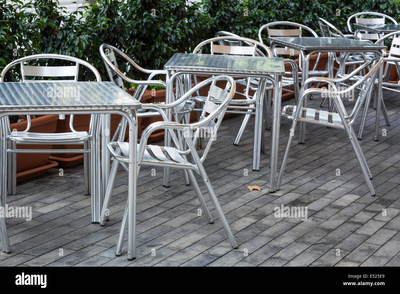 tables and chairs in a cafe Stock Photo - Alamy