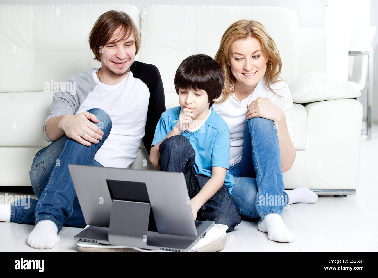 Young parents with children Stock Photo - Alamy