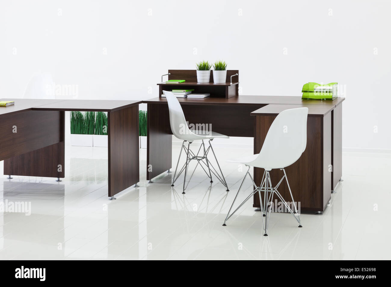 desks and chairs with reflection Stock Photo - Alamy