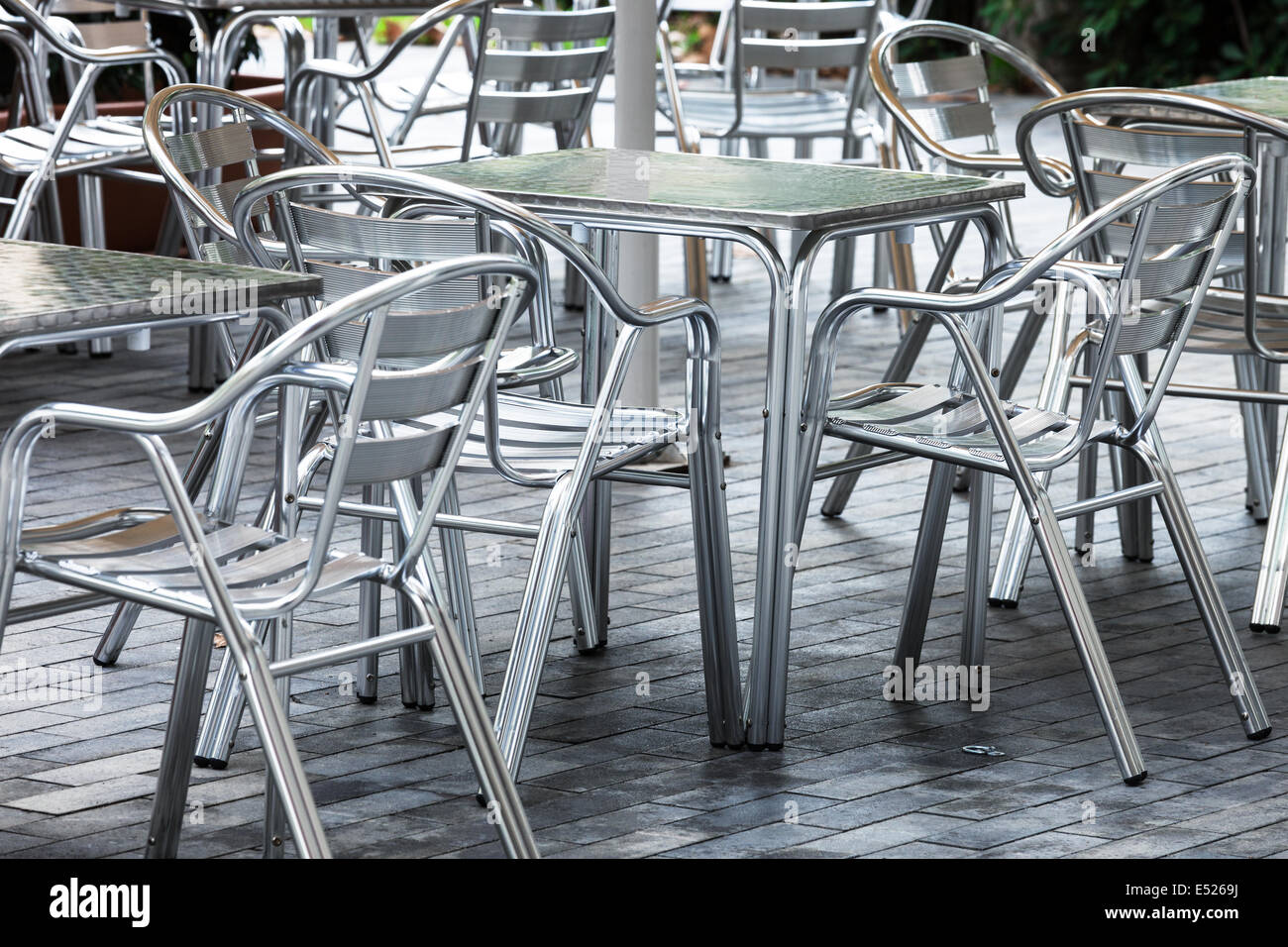 metal tables and chairs Stock Photo - Alamy