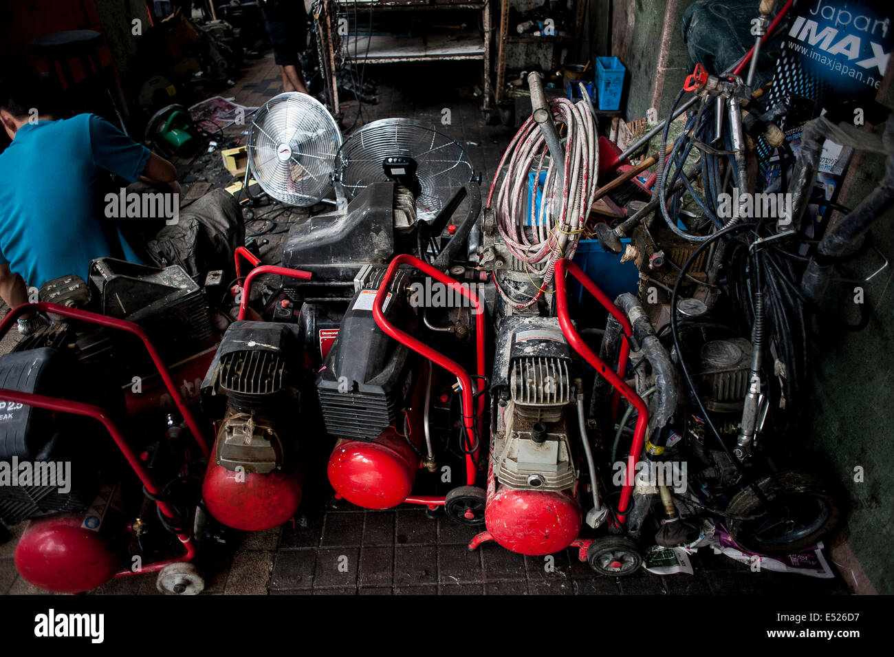 Old compressors are seen in a market in Hong Kong Stock Photo - Alamy