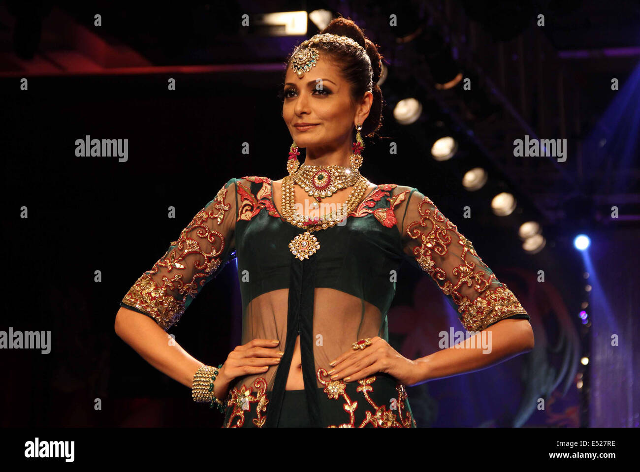 Mumbai, India. 17th July, 2014. A model displays a jewellery collection ...