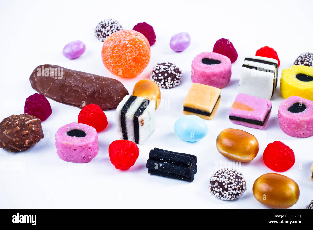Many candy on white background Stock Photo - Alamy