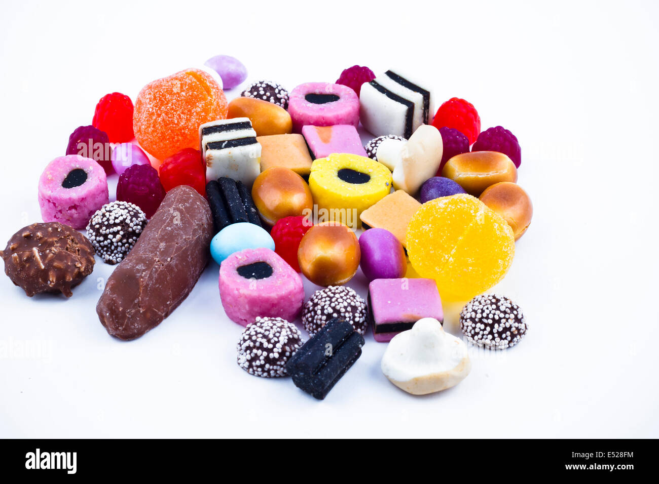 Many candy on white background Stock Photo - Alamy