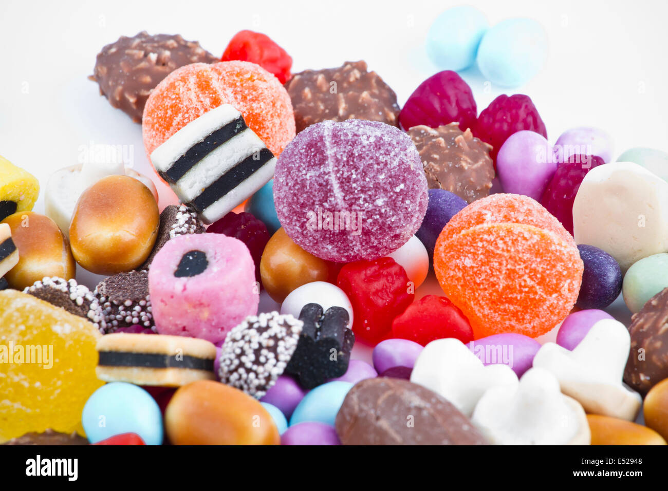 Many candy on white background Stock Photo - Alamy