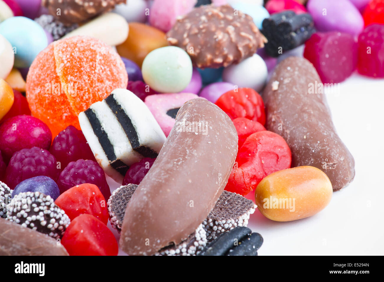 Many candy on white background Stock Photo - Alamy