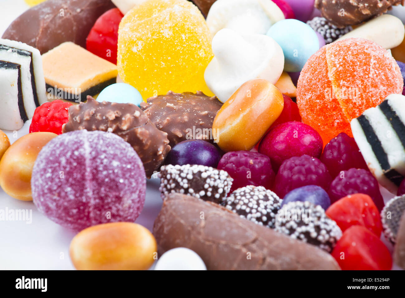 Many candy on white background Stock Photo - Alamy