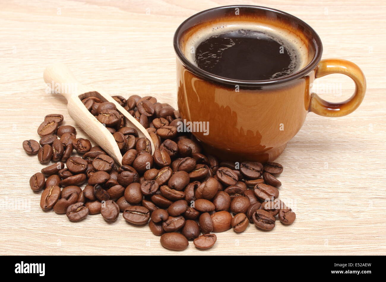 Heap of coffee grains and cup of hot beverage, cup of coffee. Isolated ...