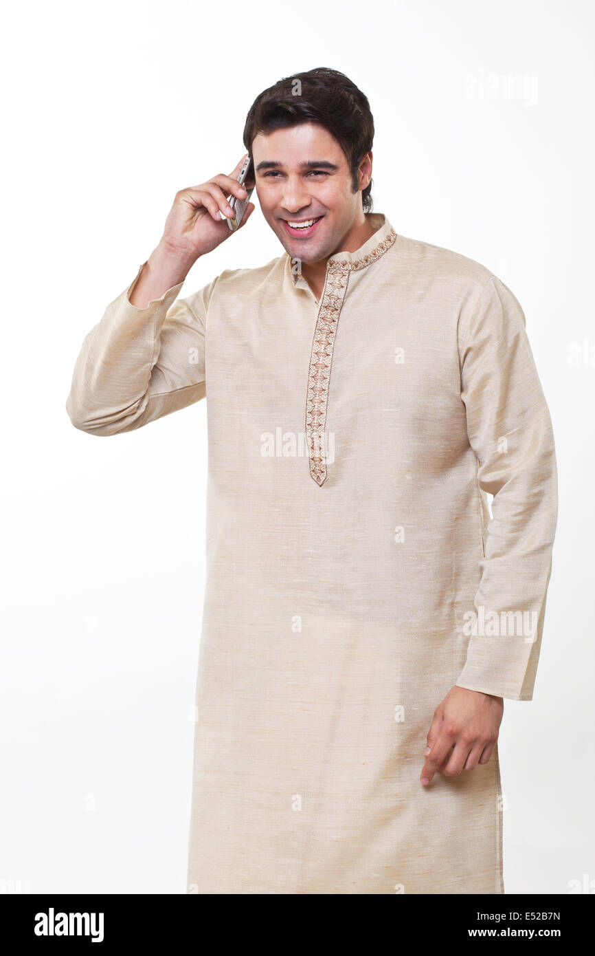 Bengali man talking on a mobile phone Stock Photo - Alamy