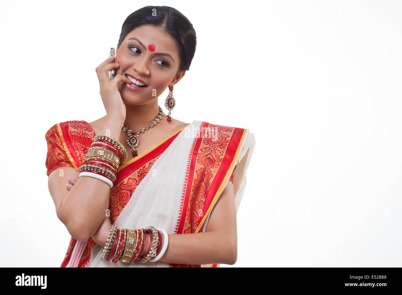 Bengali woman talking on a mobile phone Stock Photo - Alamy