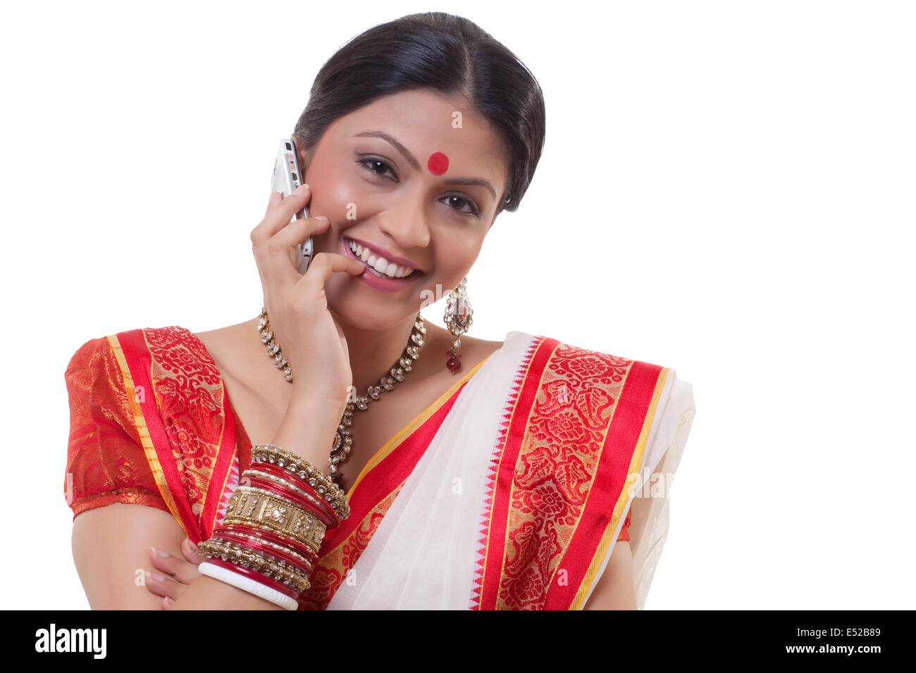 Portrait of a Bengali woman talking on a mobile phone Stock Photo - Alamy