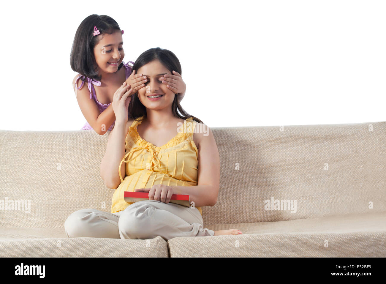 Little Girl playing Peek A Boo with her mother Stock Photo - Alamy