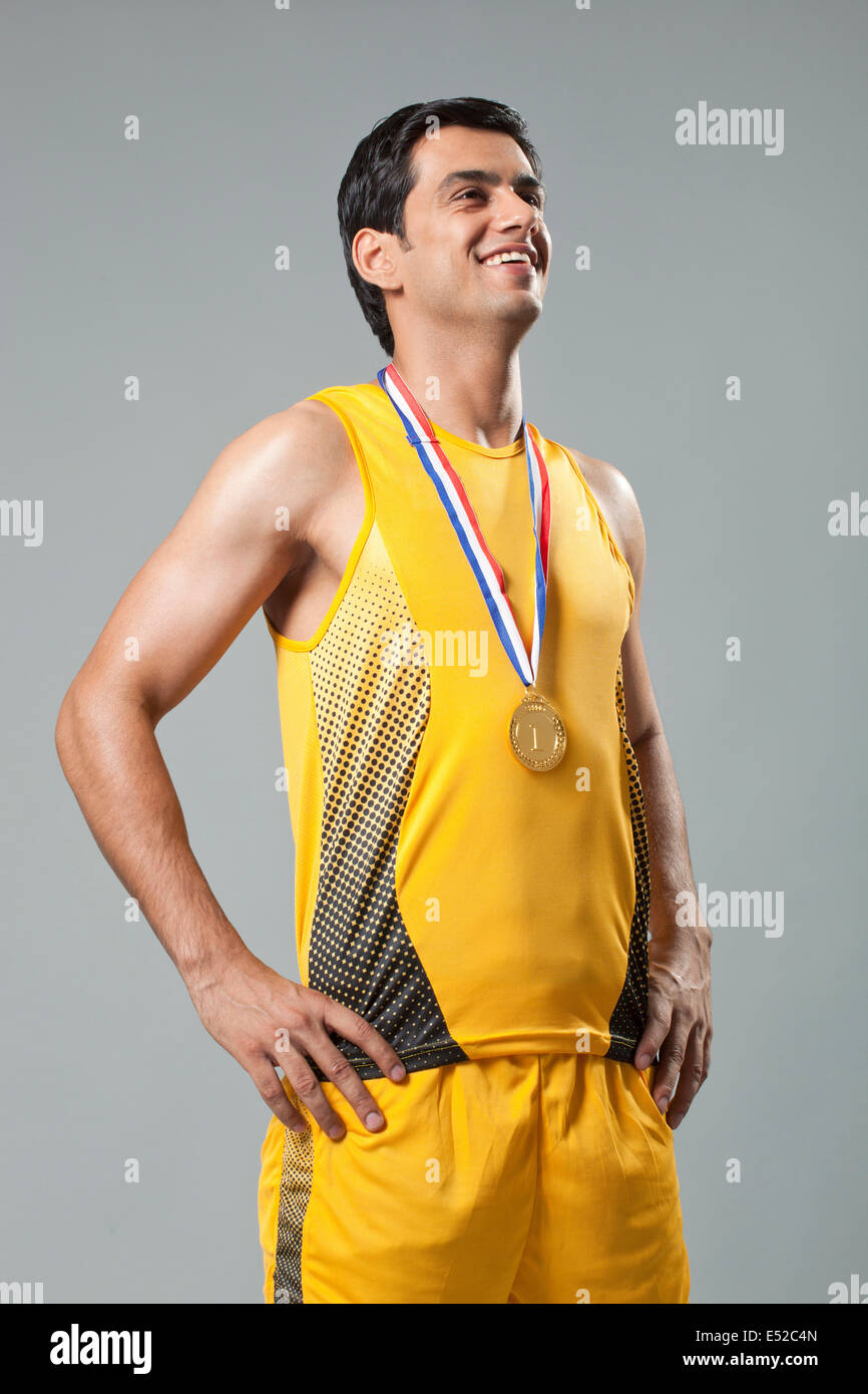 Wearing gold hi-res stock photography and images - Alamy