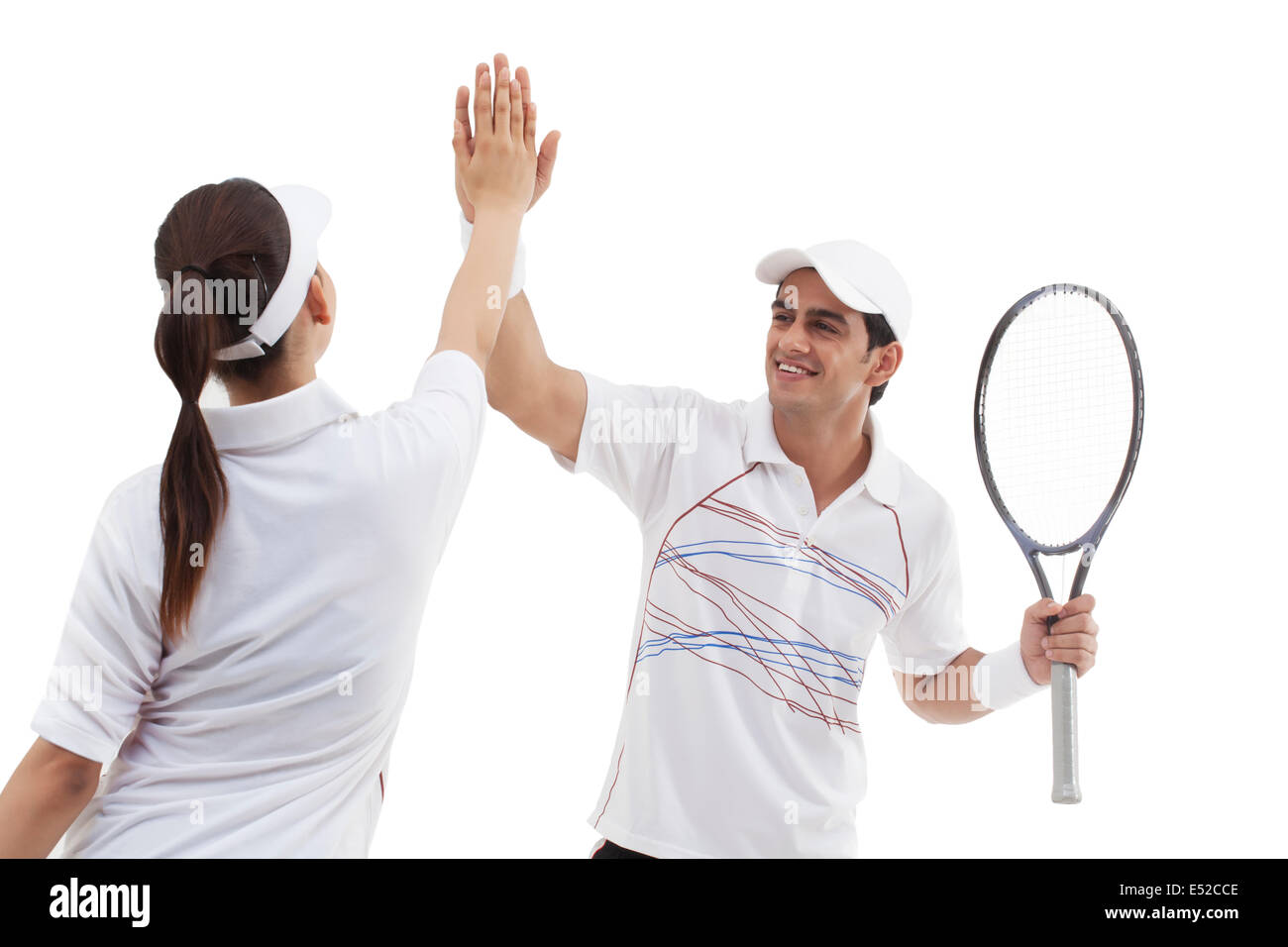 Tennis players doing high five isolated over white background Stock ...