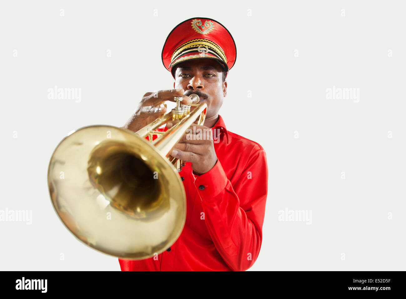 Portrait of a bandmaster playing on a trumpet Stock Photo - Alamy