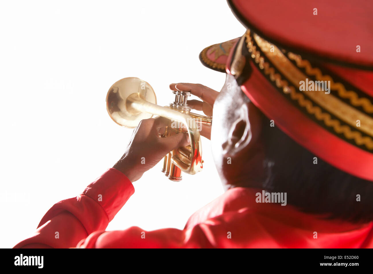 Back view of bandmaster playing on a trumpet Stock Photo - Alamy