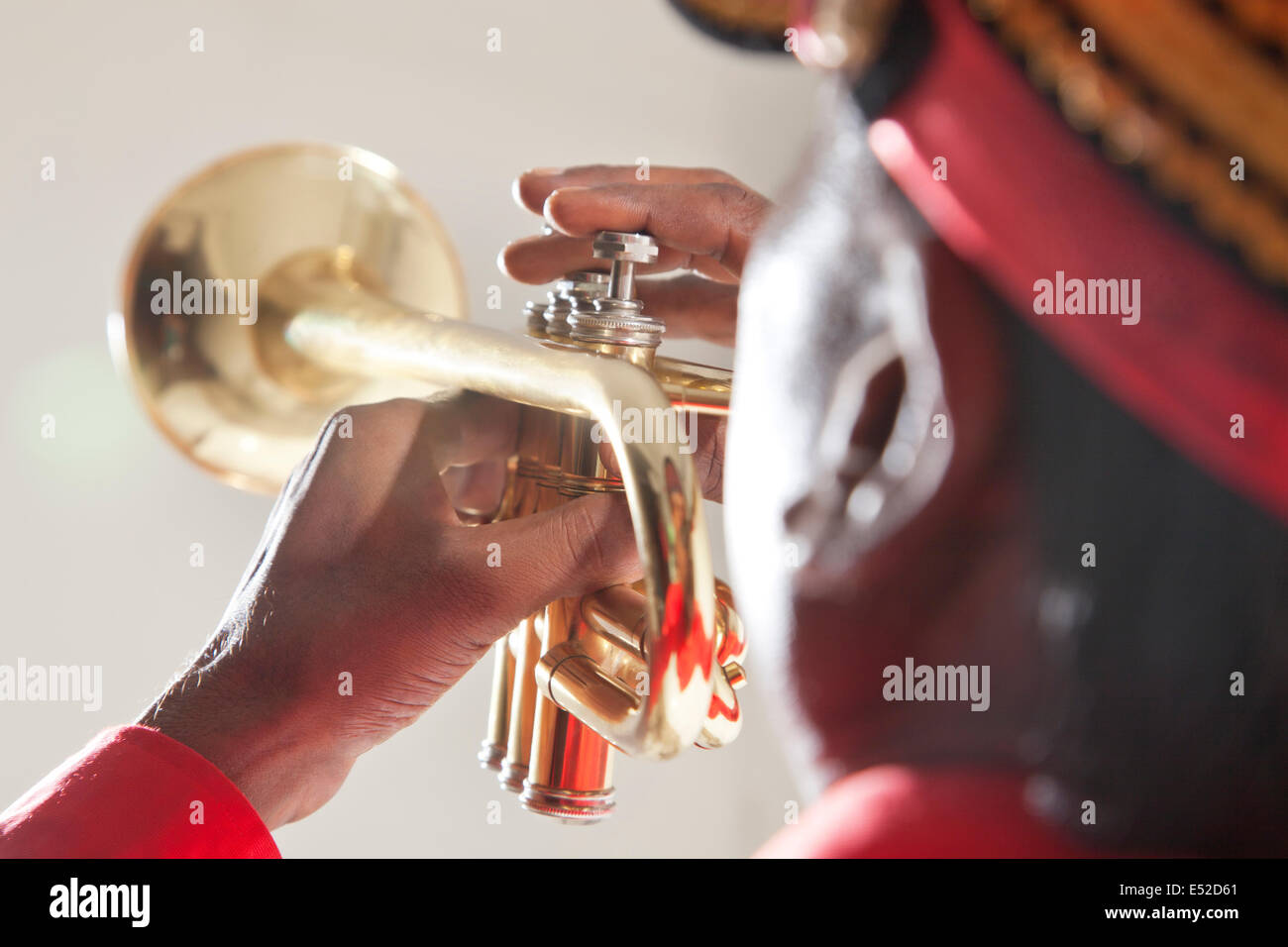 Close-up of hands playing a trumpet Stock Photo - Alamy