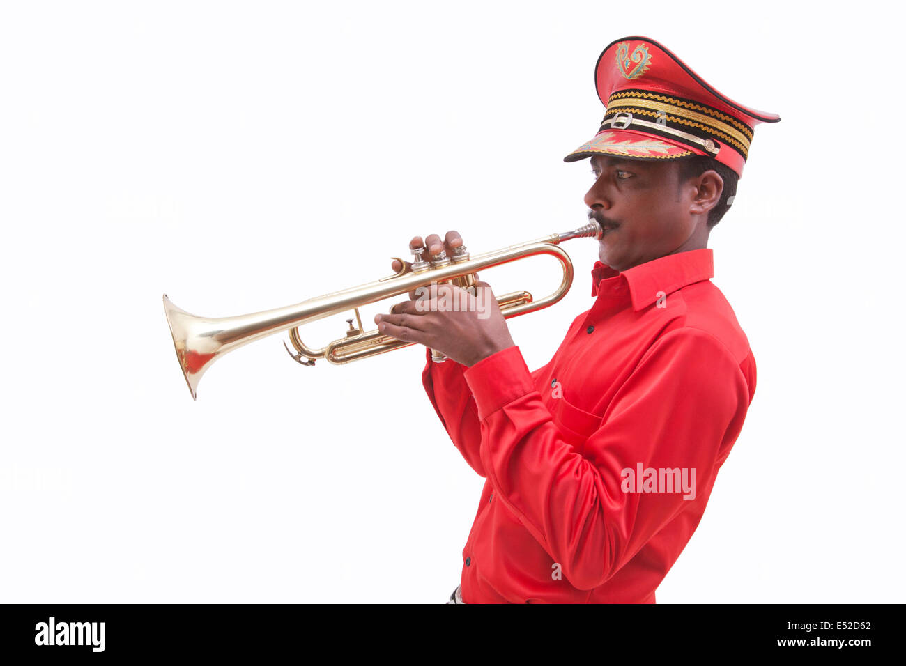 Indian man playing trumpet hi-res stock photography and images - Alamy