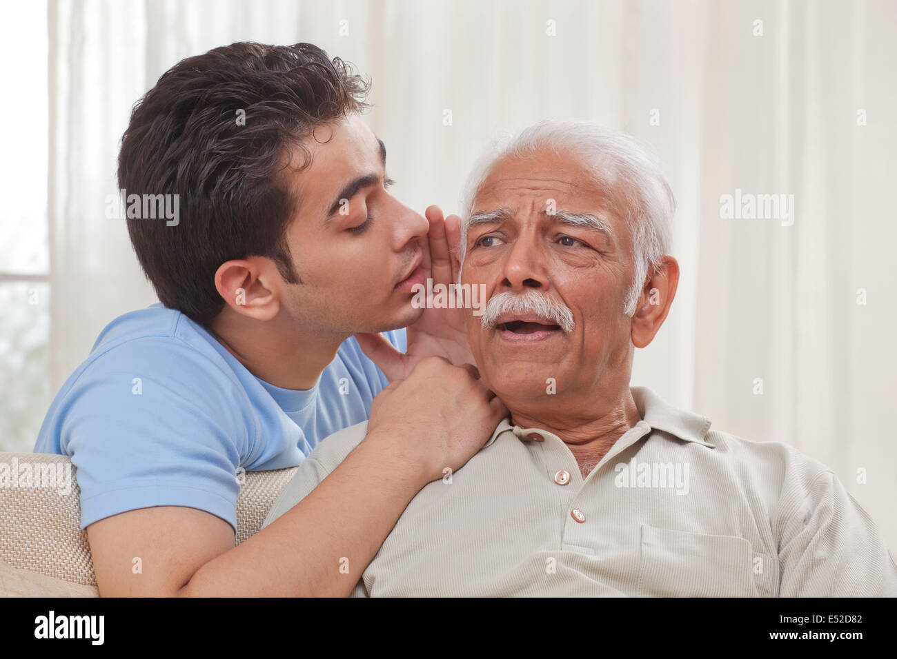 Boy sitting on grandfathers shoulders hi-res stock photography and ...