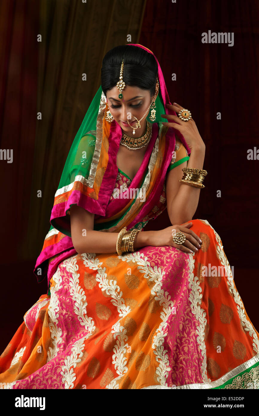 A beautiful bride sitting Stock Photo - Alamy