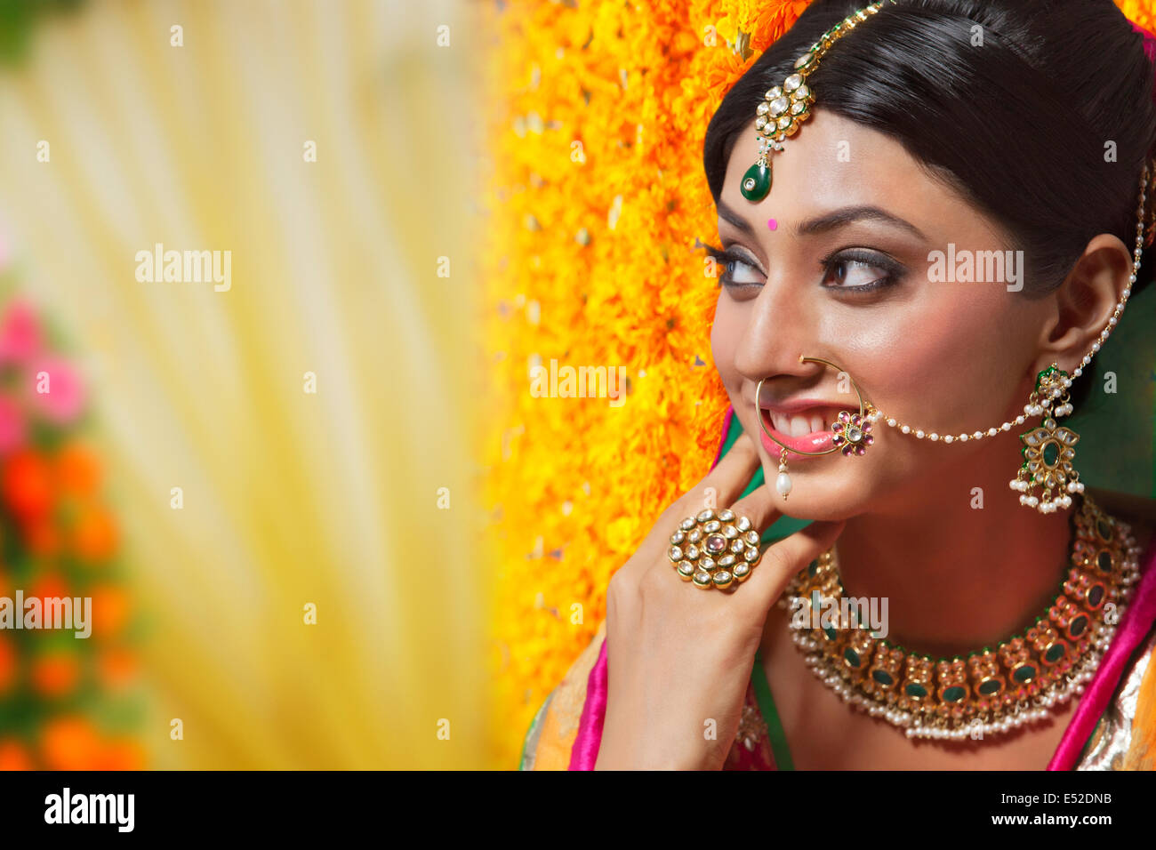 Side profile of a beautiful bride smiling Stock Photo - Alamy