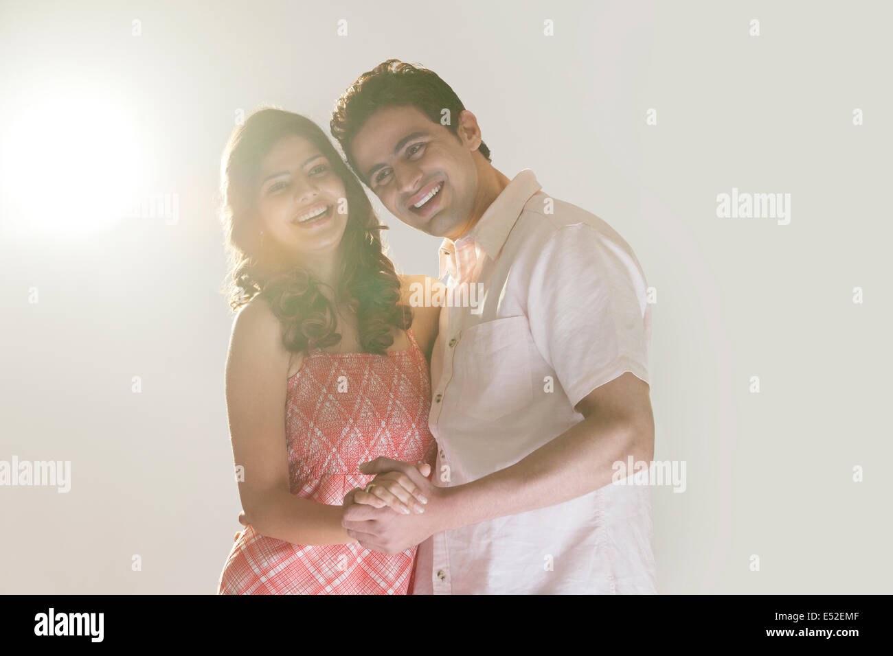 Couple holding each other Stock Photo - Alamy