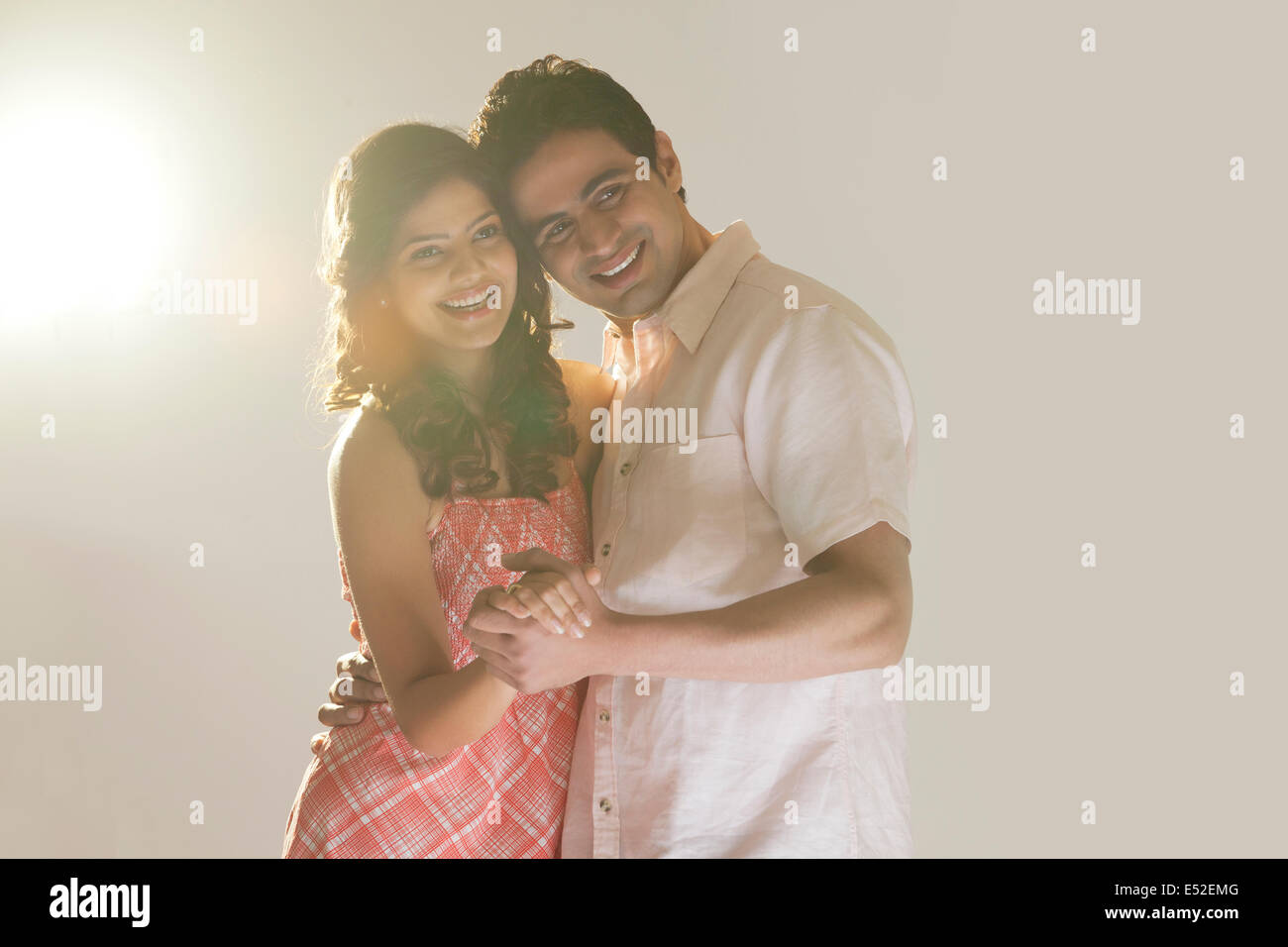 Couple holding each other Stock Photo - Alamy