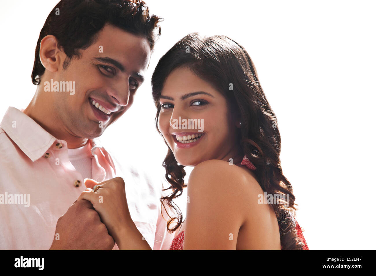 Portrait of couple holding each other Stock Photo - Alamy