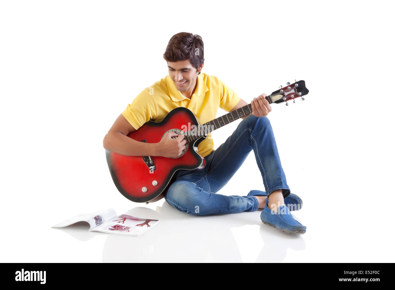 One man sitting reading book Cut Out Stock Images & Pictures - Alamy