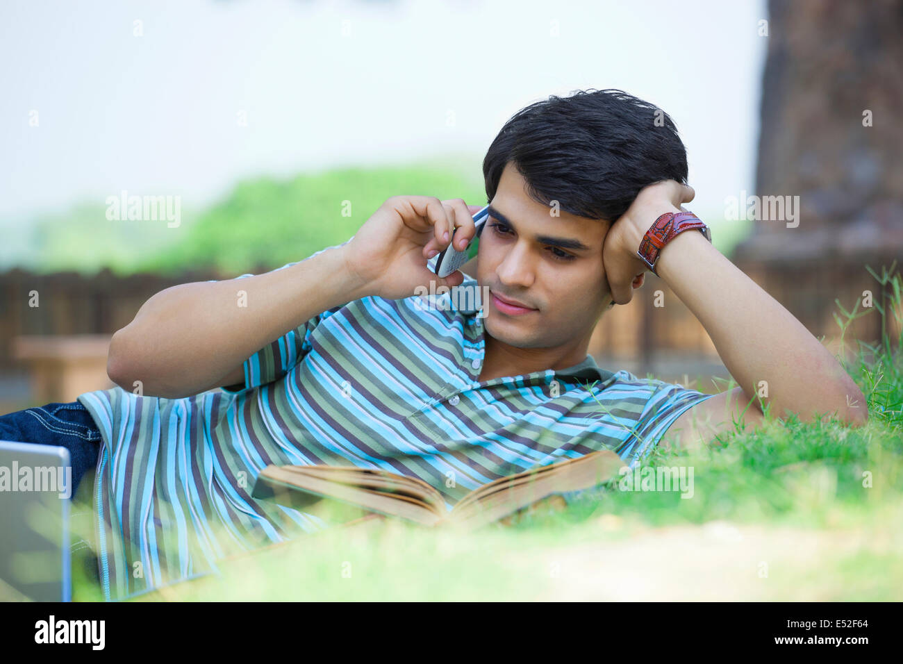 Indian male student talking hi-res stock photography and images - Alamy