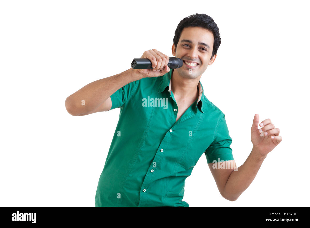 Indian man singing microphone smiling hi-res stock photography and ...