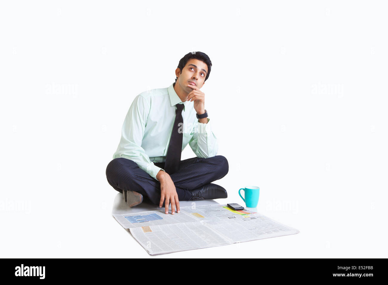 Business executive thinking Stock Photo - Alamy